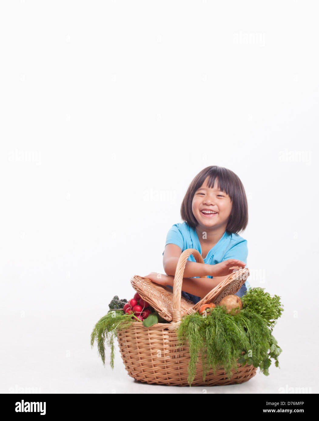 Child with Basket of Vegetables Stock Photo - Alamy
