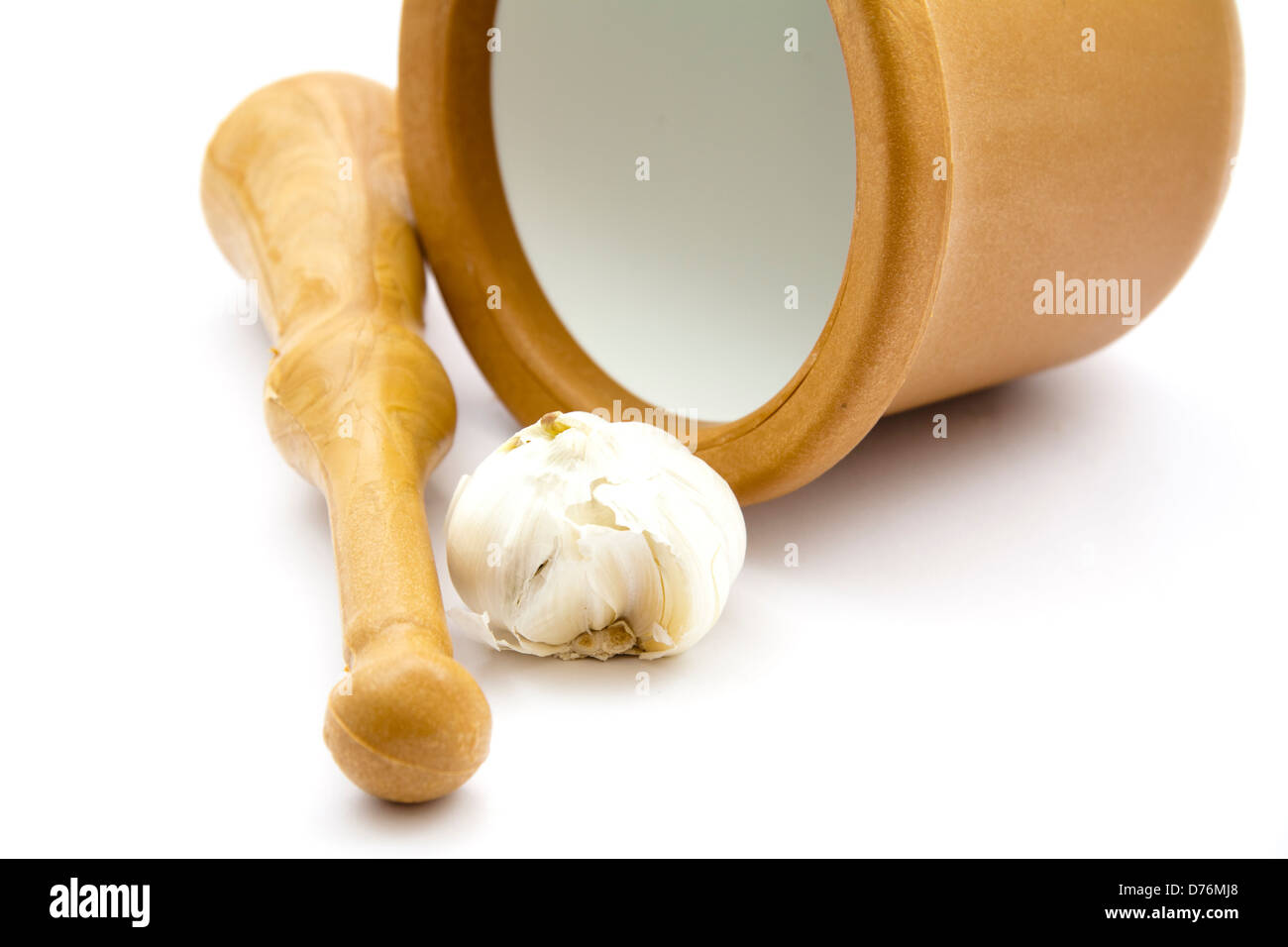 Brown mortar with garlic Stock Photo - Alamy