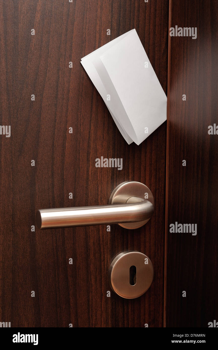 Door with a note Stock Photo - Alamy