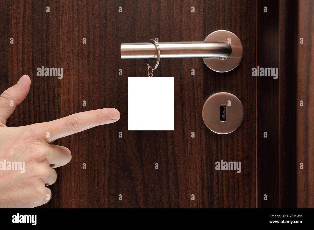 Door and hand pointing place for inscription Stock Photo - Alamy