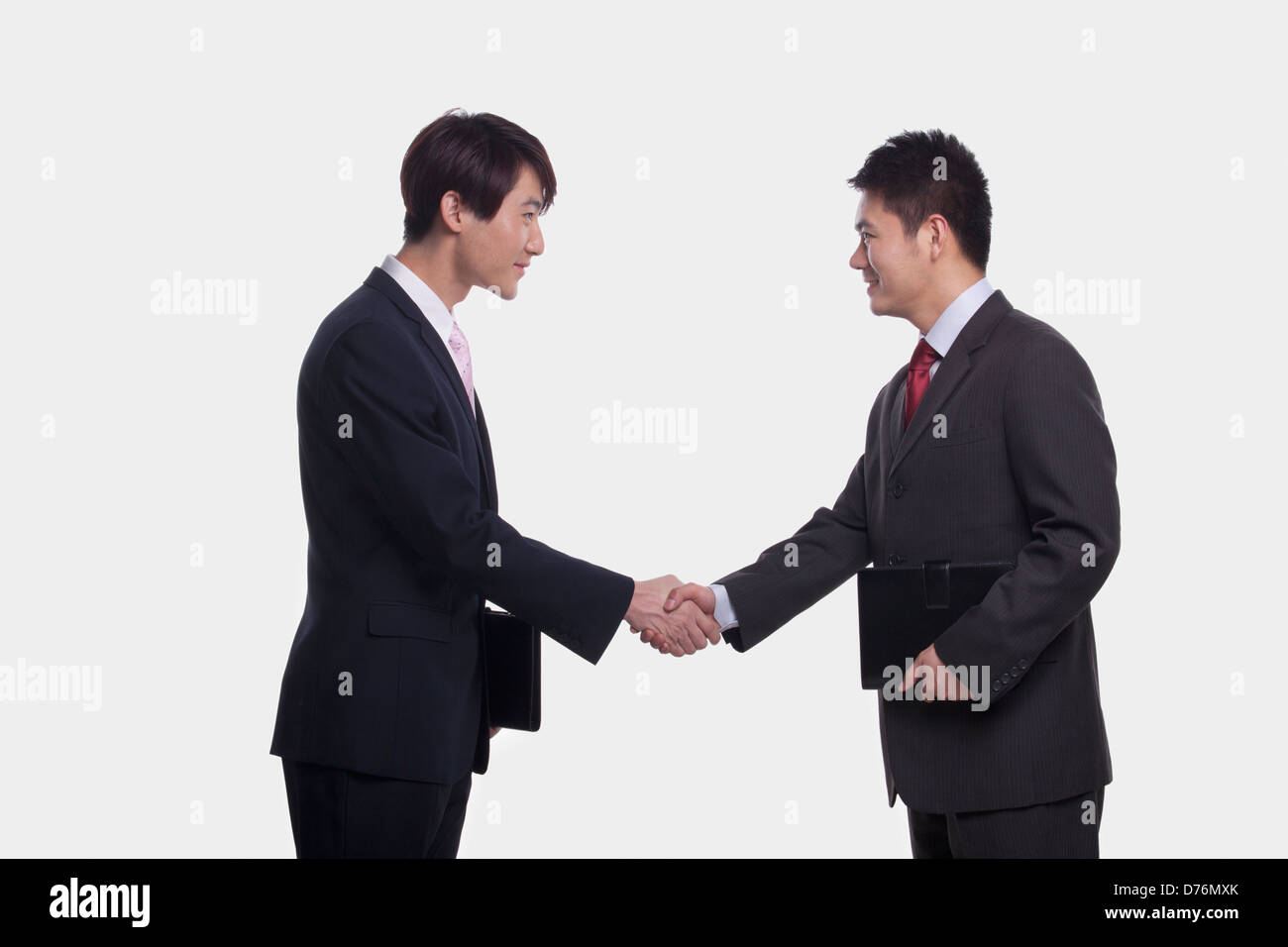 Two Businessmen Shaking Hands Stock Photo - Alamy