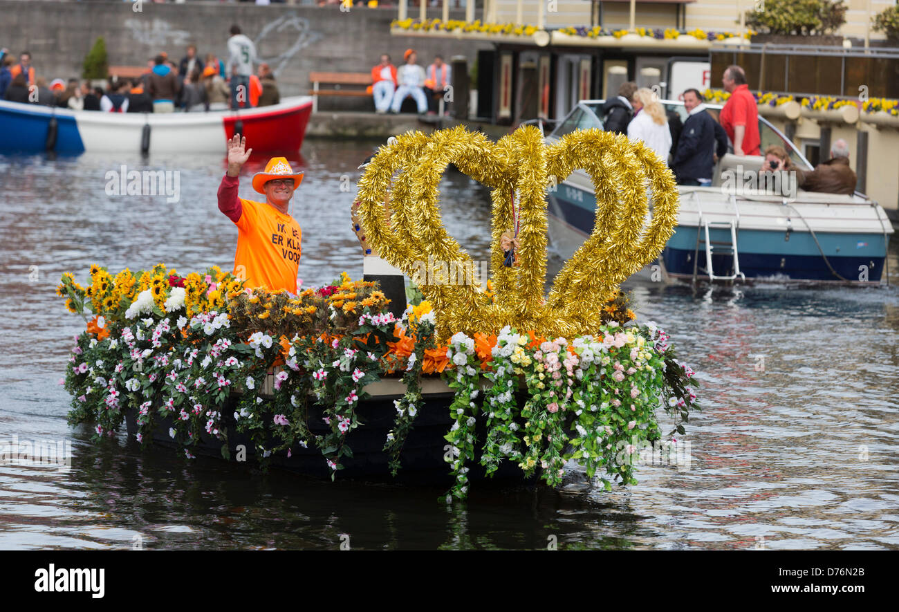 Amsterdam, The Netherlands. 30 April 2013. Dutch people and tourists ...