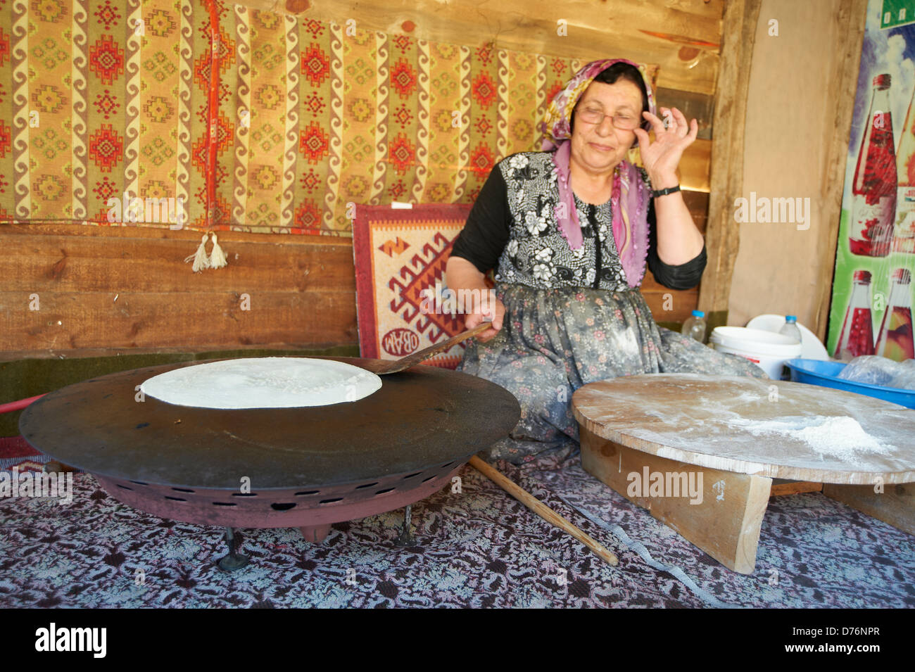 An old woman frying local bread in Turkey, Cappadocia Stock Photo - Alamy