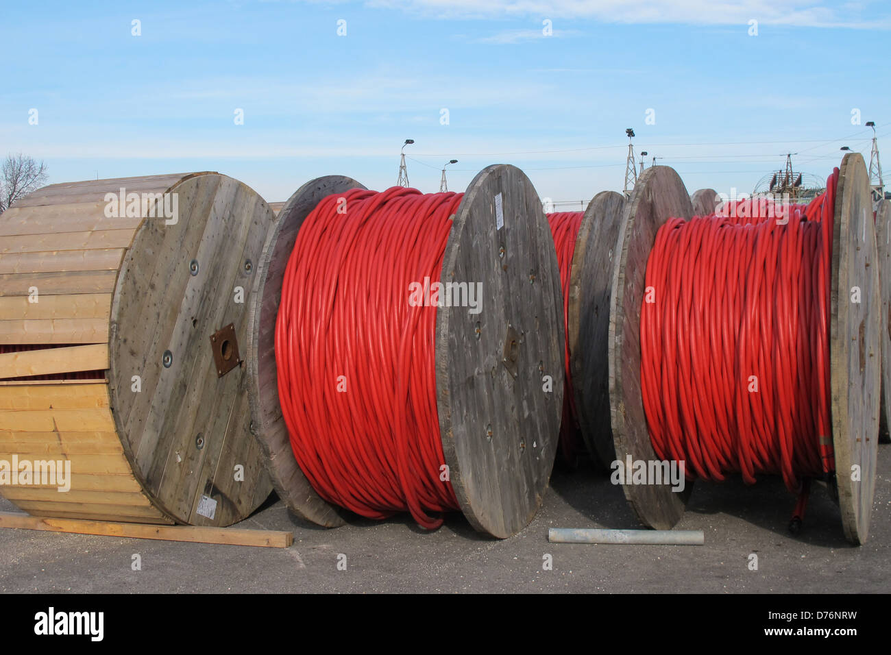 huge red electrical cable reels for the transport of electricity high ...