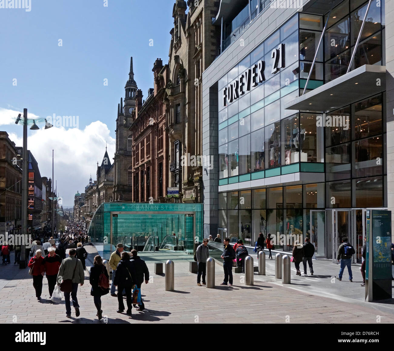 Visitors and shoppers in Buchanan Street Glasgow Scotland with entrance ...