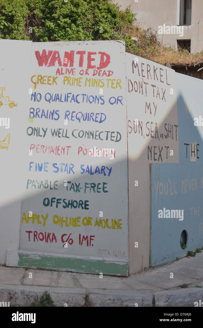 Protest board against greek prime minister in Athens Stock Photo - Alamy