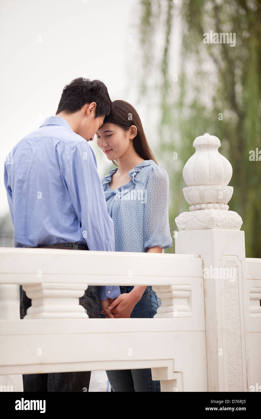Young Couple Touching Foreheads Stock Photo - Alamy