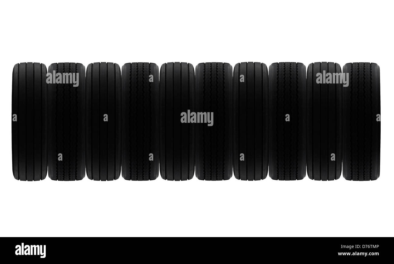 line of radial and cross ply rubber tyres to make frame, border or ...