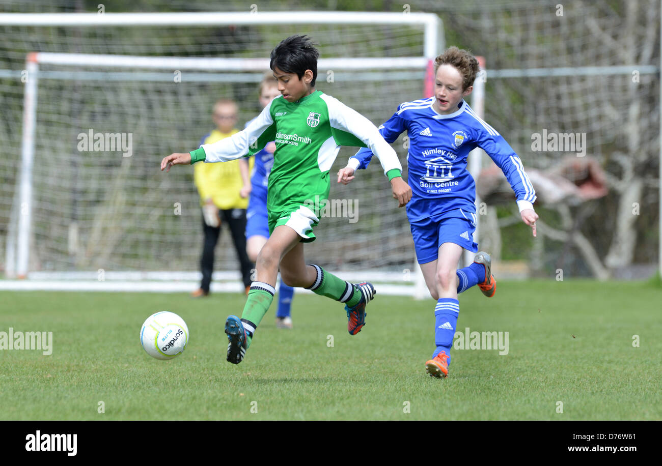 Football match children hi-res stock photography and images - Alamy