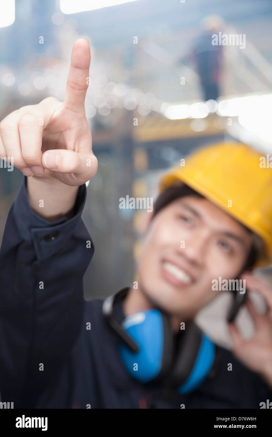 Portrait of Young Engineer Pointing Stock Photo - Alamy