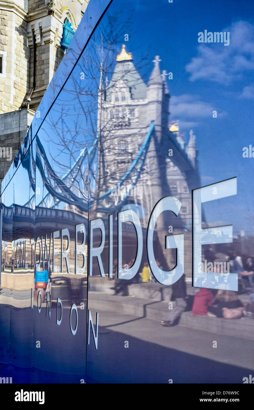 Tower Bridge reflected in the sign of One Tower Bridge Stock Photo - Alamy