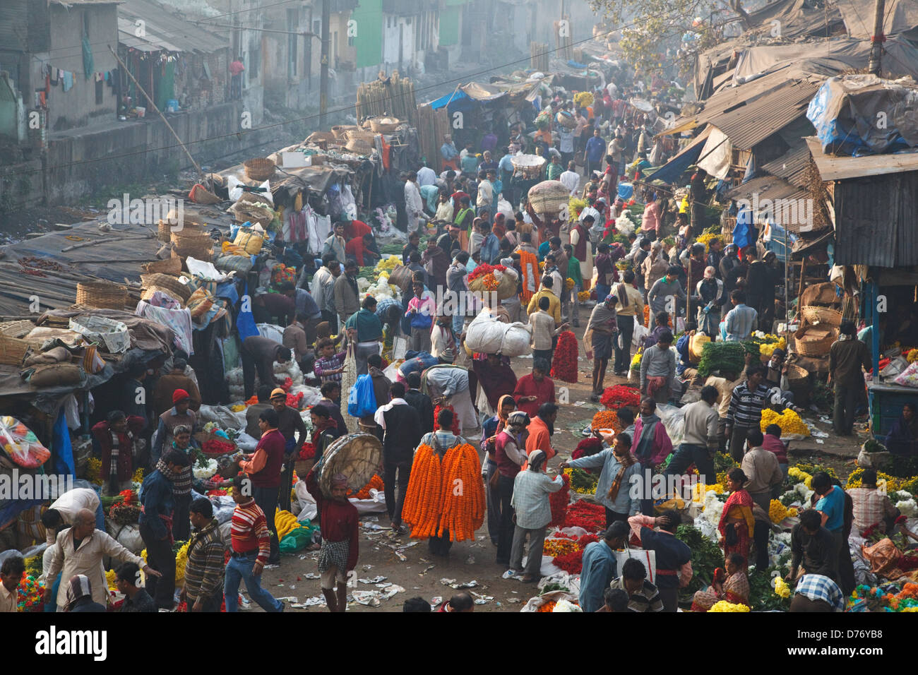 Colorful flower market at Mullick ghat near Howrah Bridge in Kolkata ...