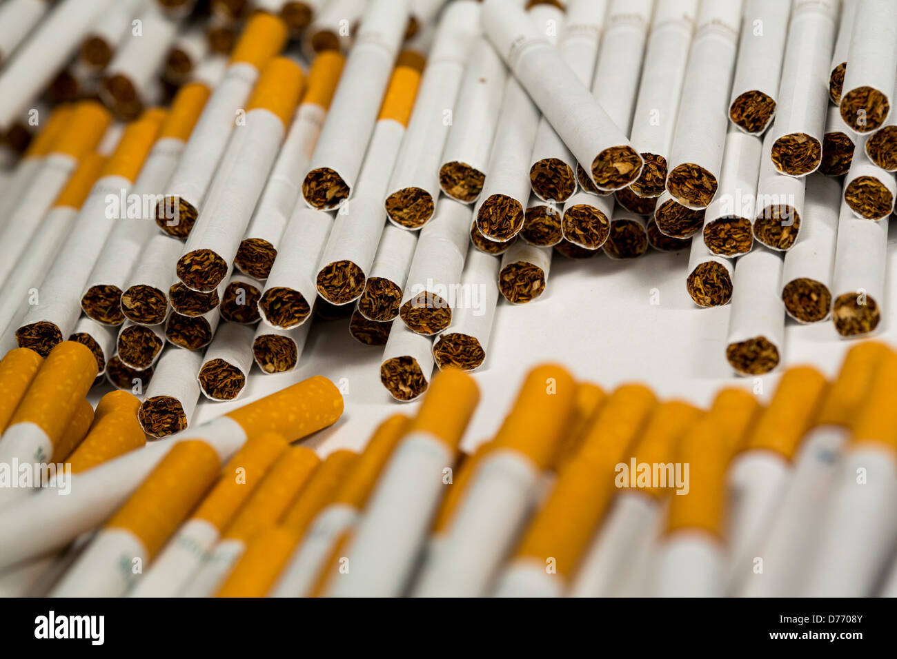 Loose, unpackaged cigarettes Stock Photo - Alamy