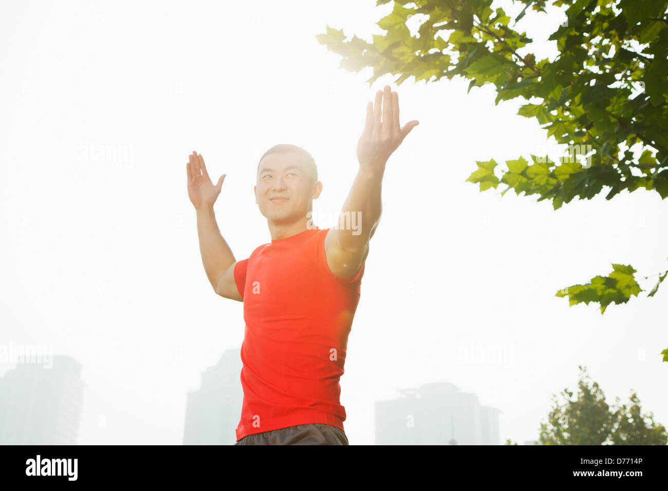 Young Muscular Man Stretching Stock Photo - Alamy