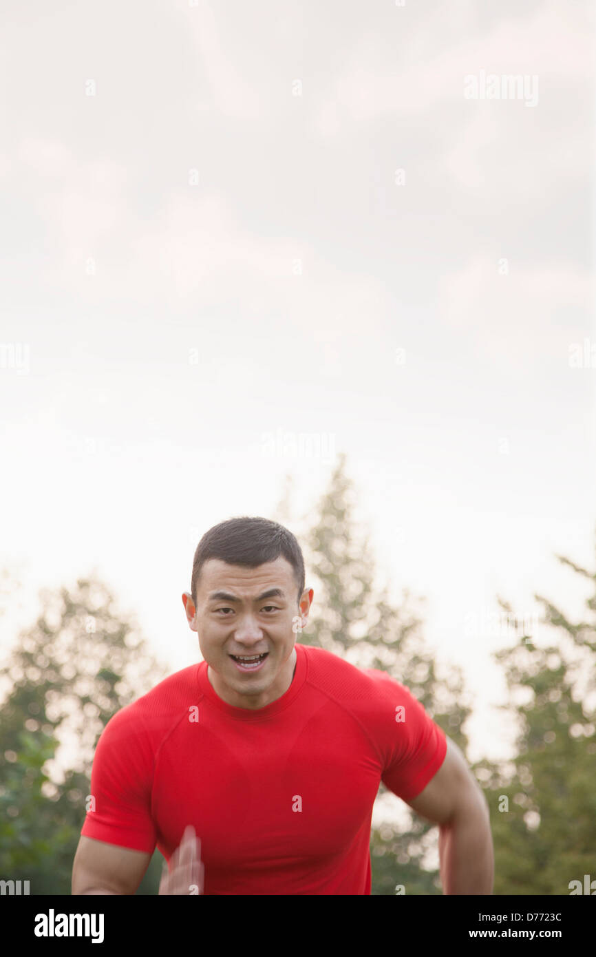 Muscular Man Running Toward Camera Stock Photo - Alamy