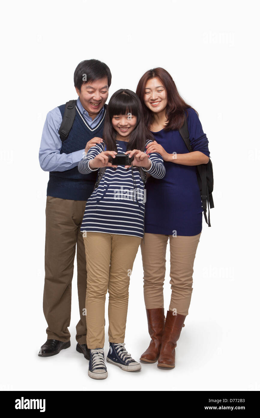 Family taking picture with digital camera Stock Photo - Alamy