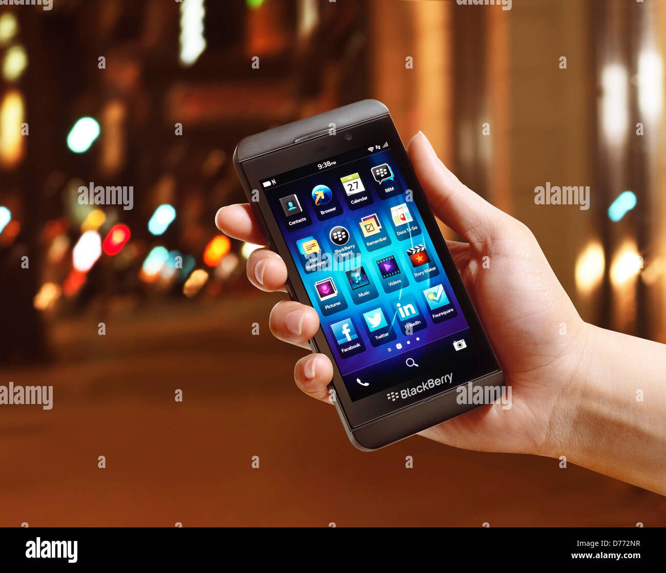 Hand smartphone on blurred hi-res stock photography and images - Alamy