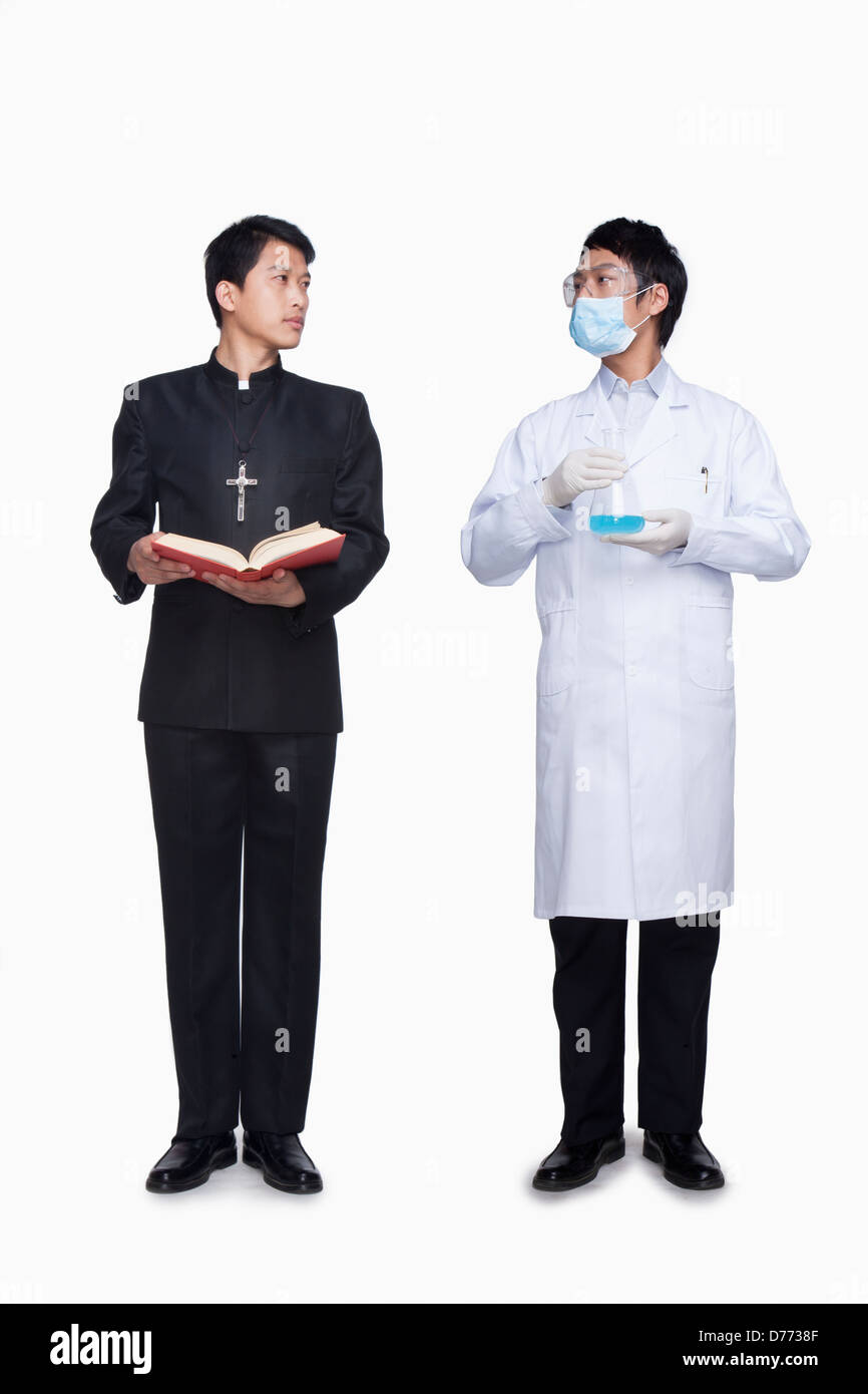 Priest and scientist Stock Photo - Alamy