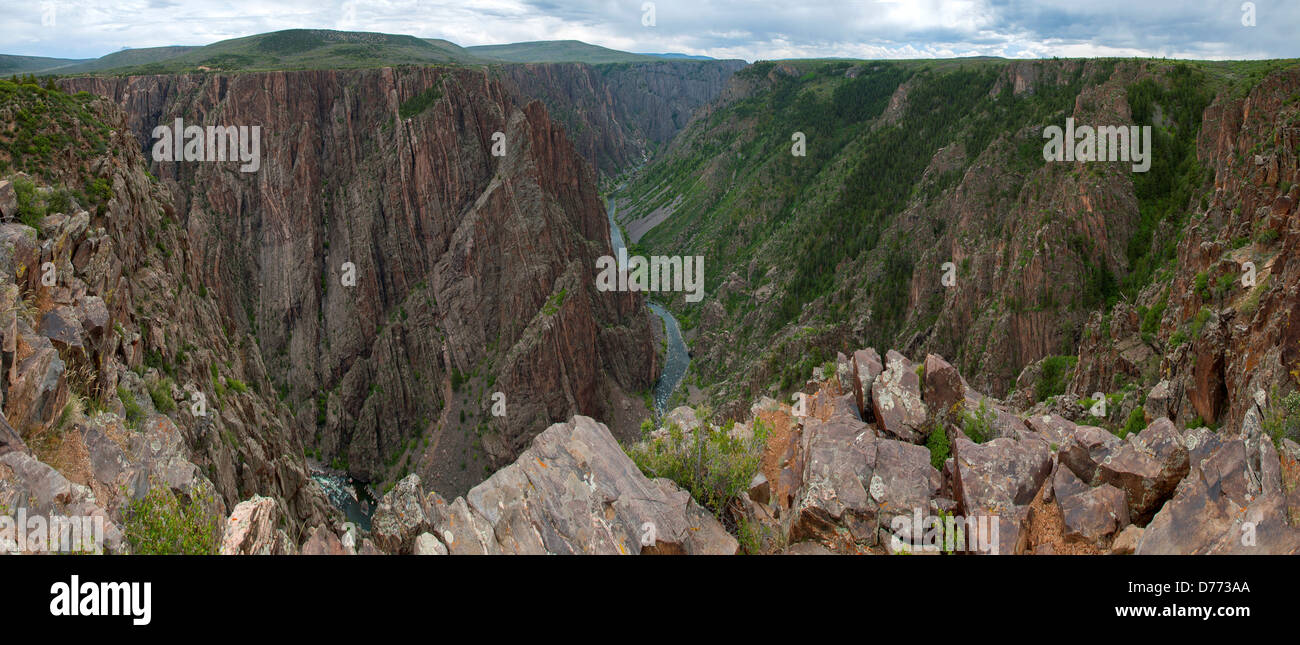 A panorama shows Black Canyon Gunnison National Park deep steep-sided ...