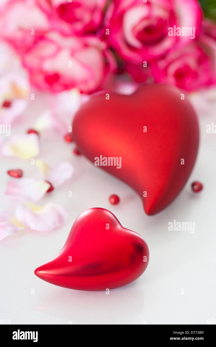 Hearts with roses isolated on white Stock Photo - Alamy