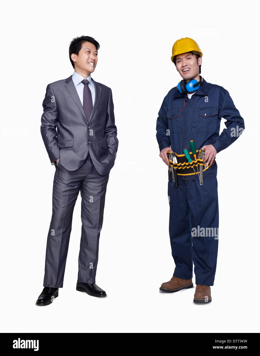 Businessman and construction worker Stock Photo - Alamy