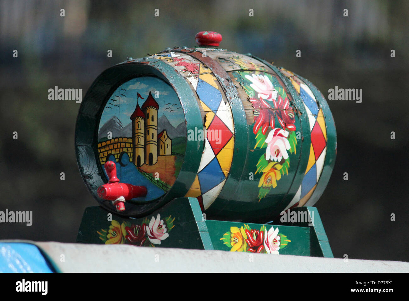 Painted canal ware barrel on traditional narrowboat or barge, Regents ...