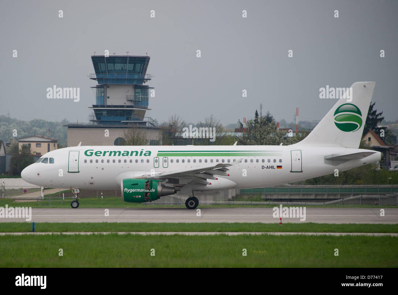 A Germania airplane takes off from the airport in Stuttgart, Germany ...