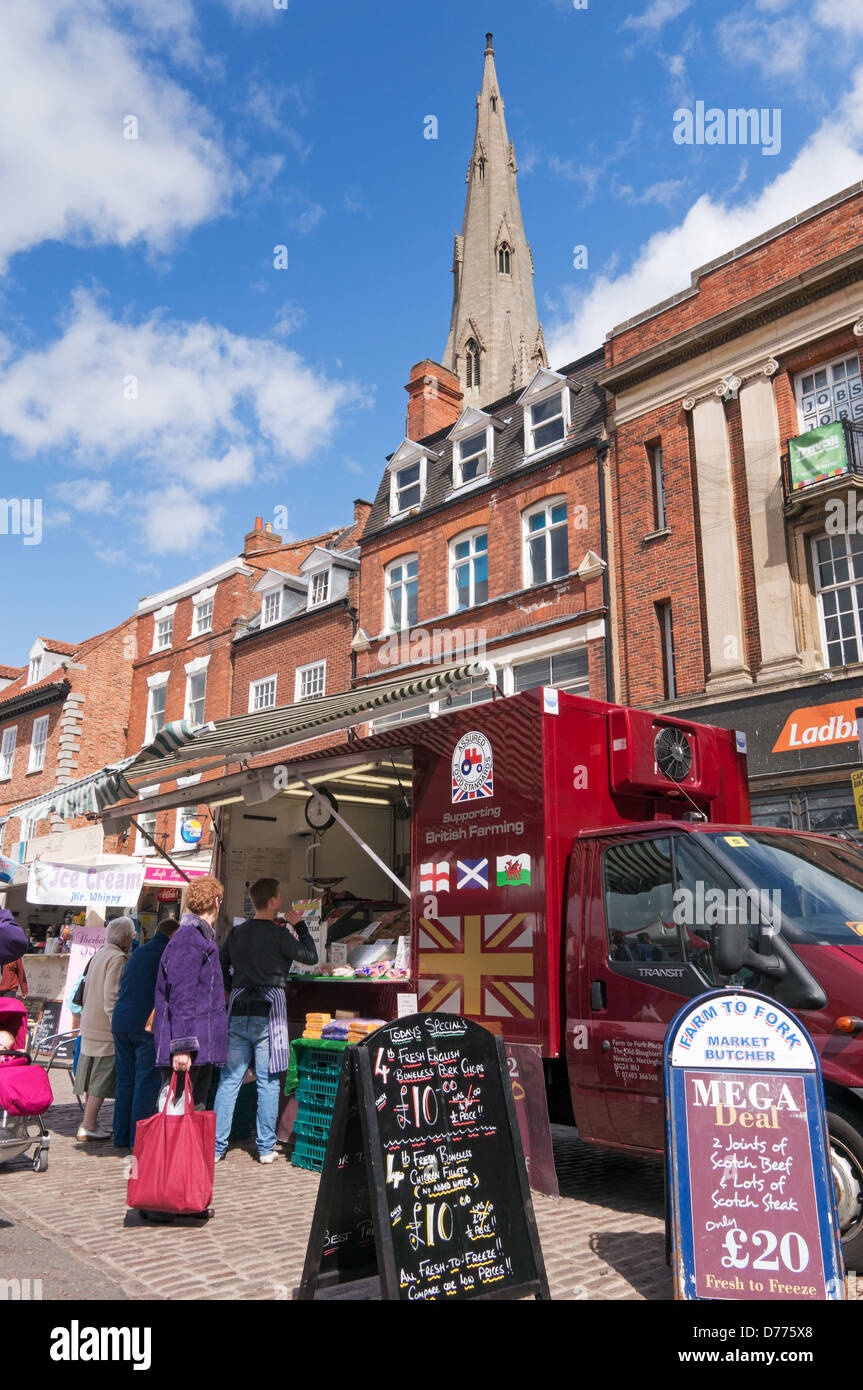Mobile butcher's van in Newark Market place with the parish church in ...