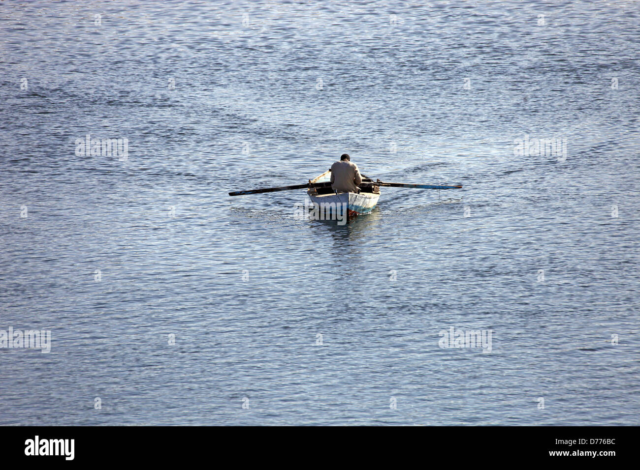 Man in rowing boat hi-res stock photography and images - Alamy