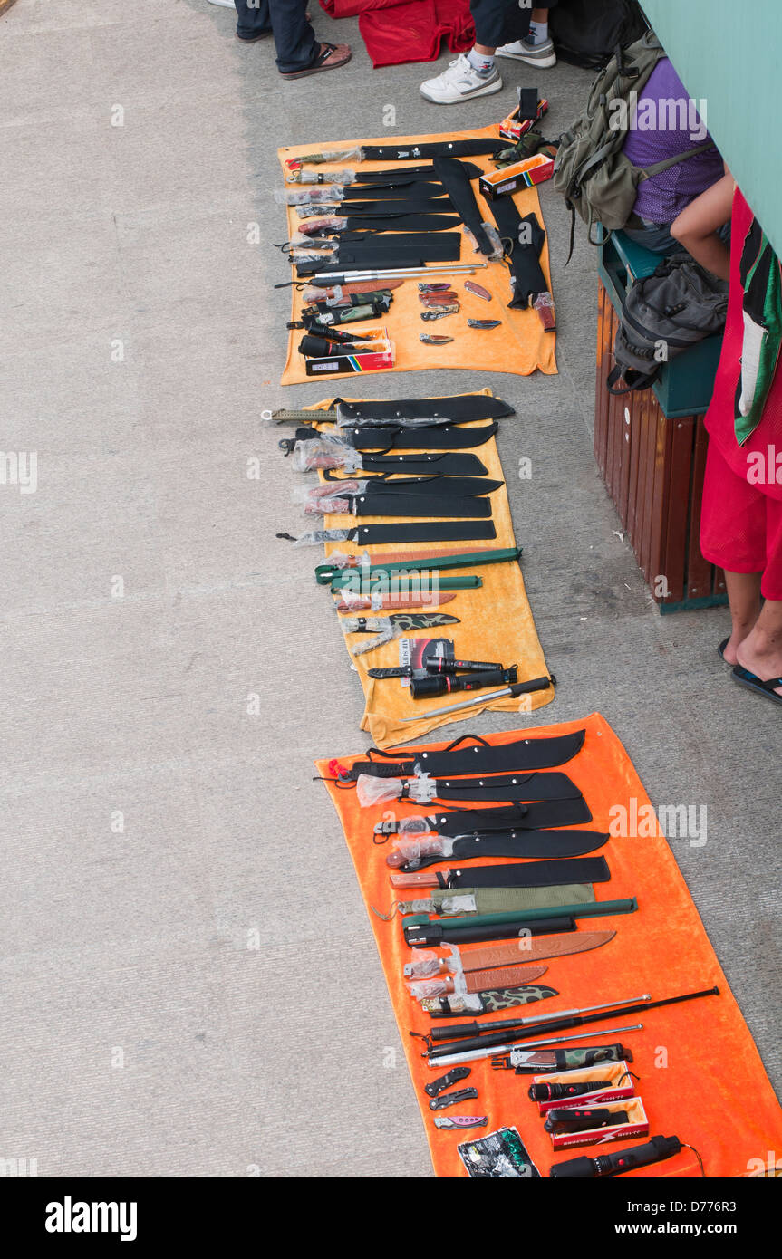 China, Shanghai, selling weapons on street Stock Photo - Alamy