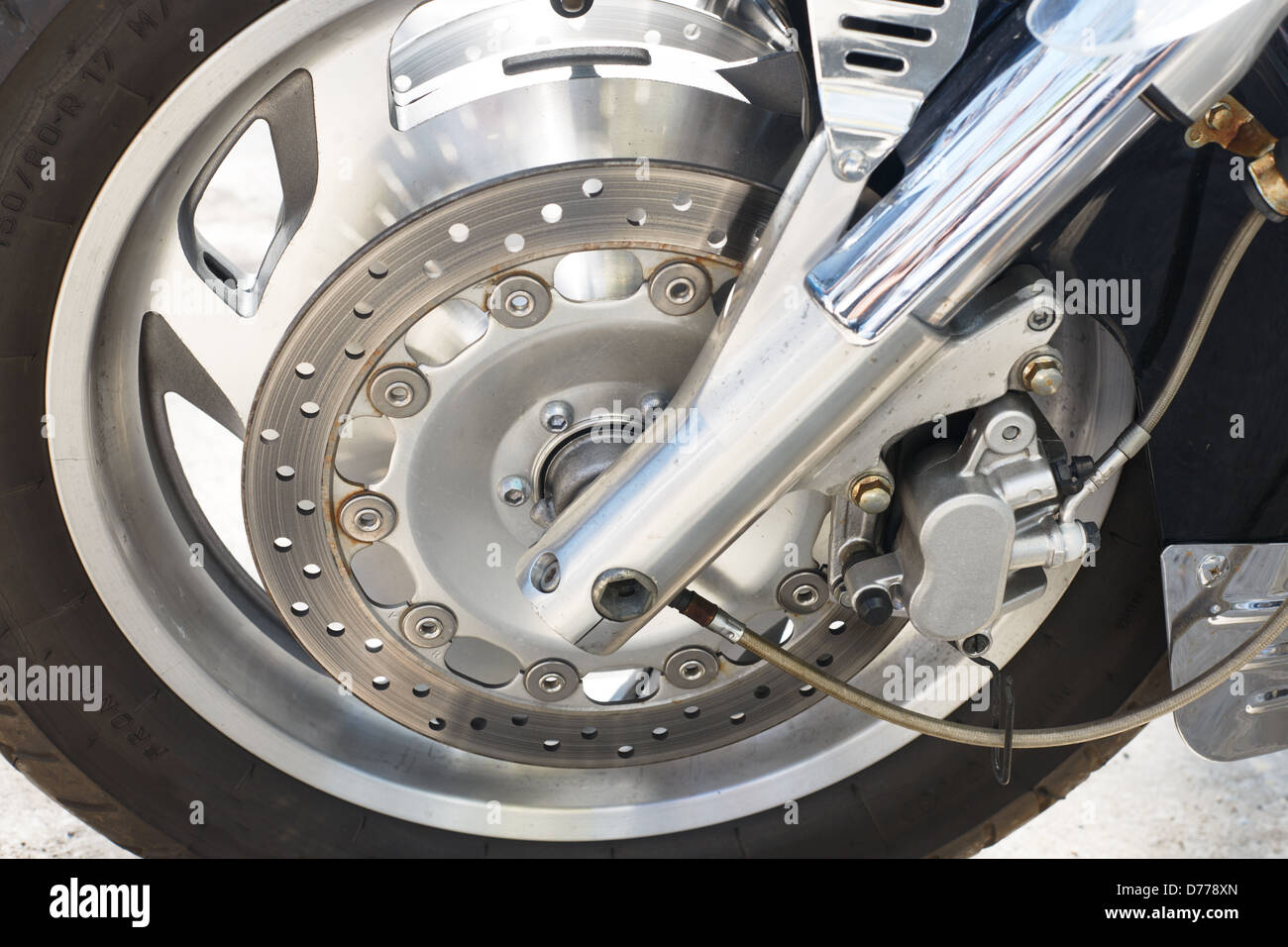 Front wheel with brake disc and braking system of a big chrome-plated ...