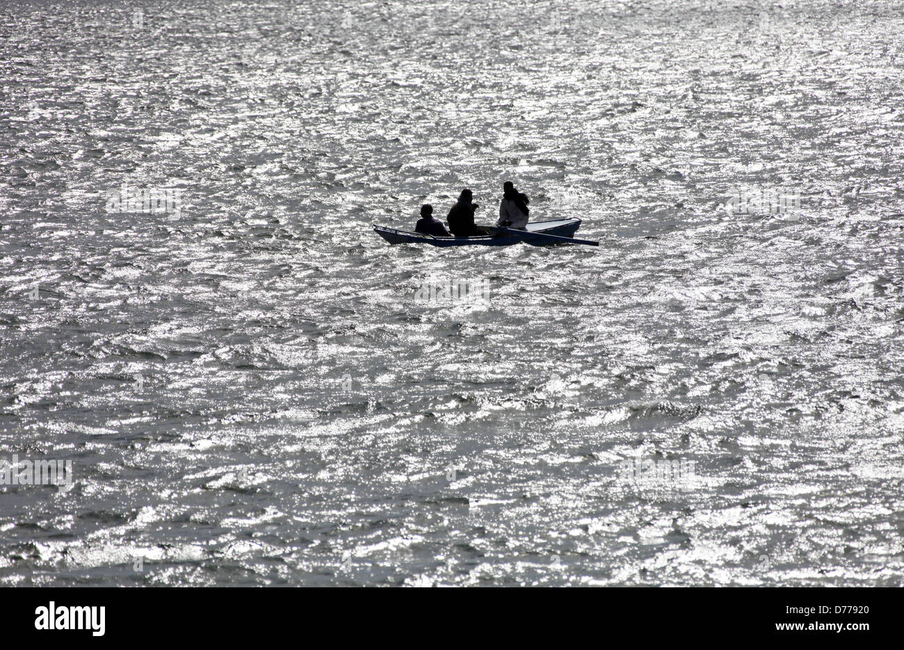 Men in rowing boat hi-res stock photography and images - Alamy