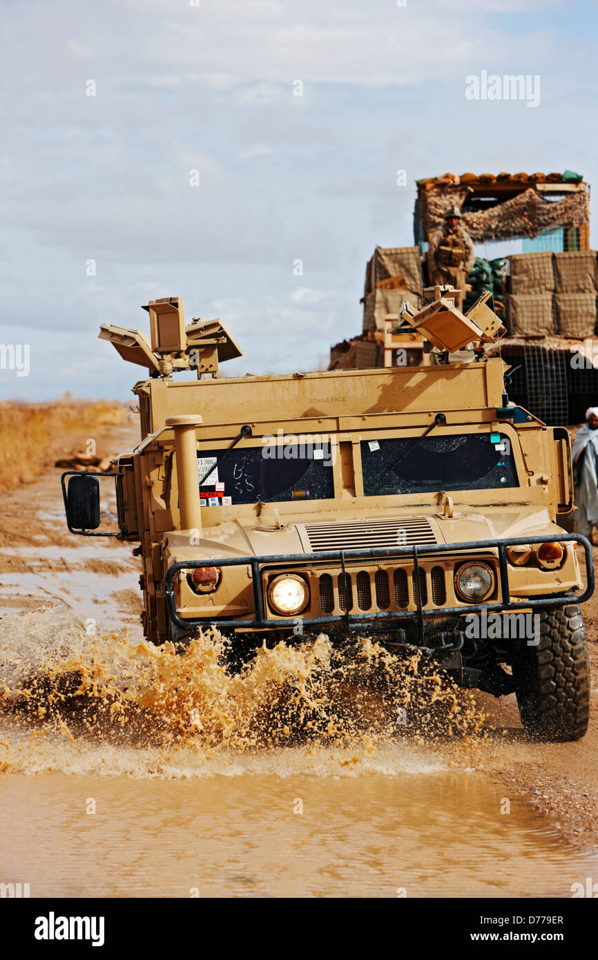 HUMVEE Driving Through Mud Puddle Helmand Province Afghanistan Stock ...