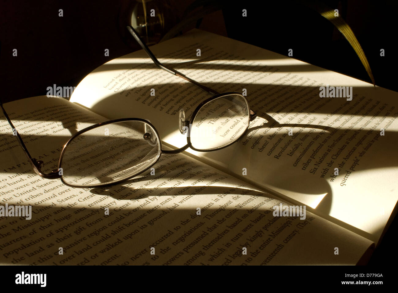 book and reading glasses Stock Photo - Alamy