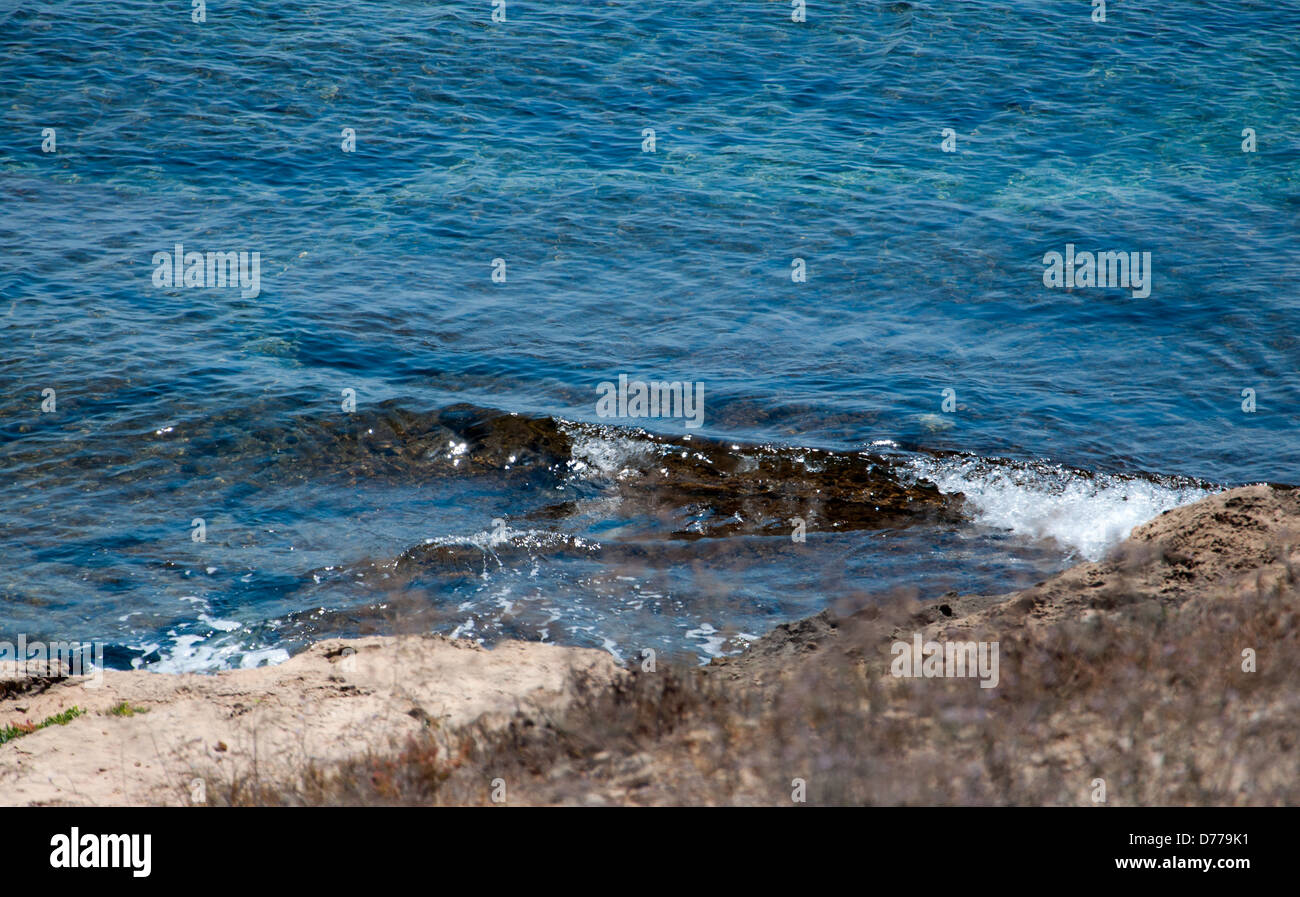 Small wave slapping the beach, Majorca, Spain Stock Photo - Alamy