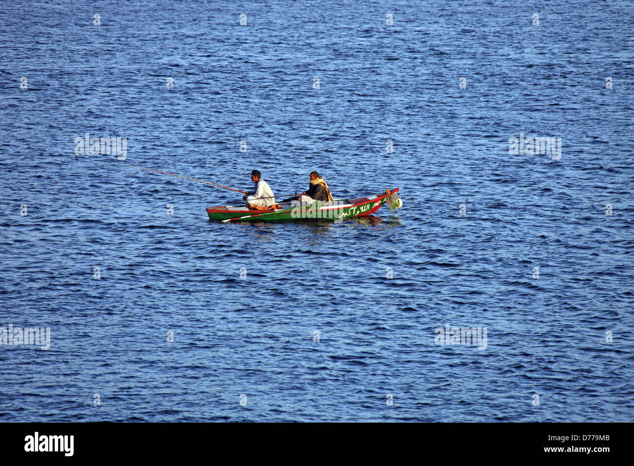 Fishermen in rowing boat hi-res stock photography and images - Alamy