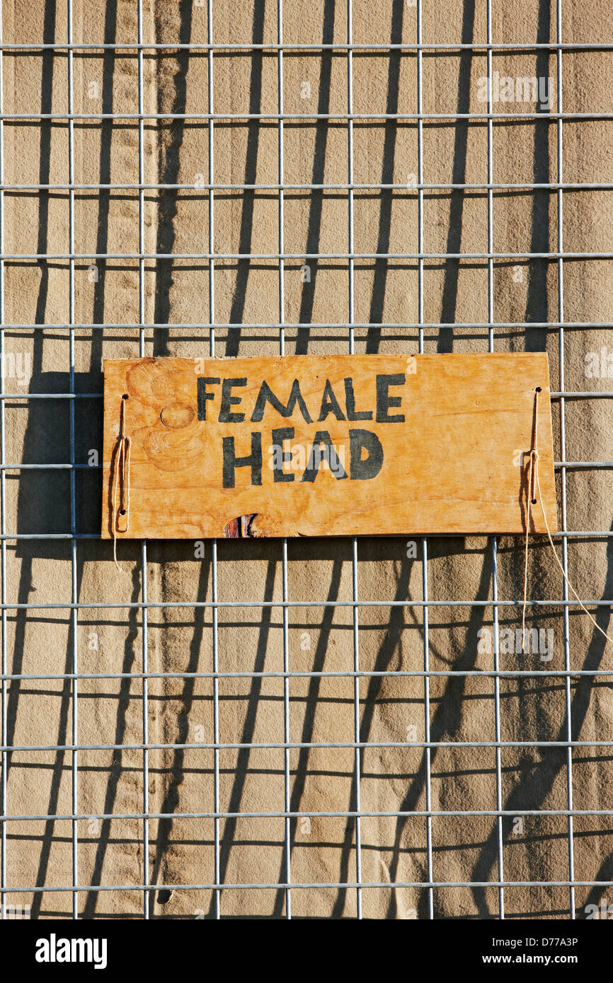 A Makeshift Sign Female Bathroom at U.S. Marine Corps Combat Outpost in ...