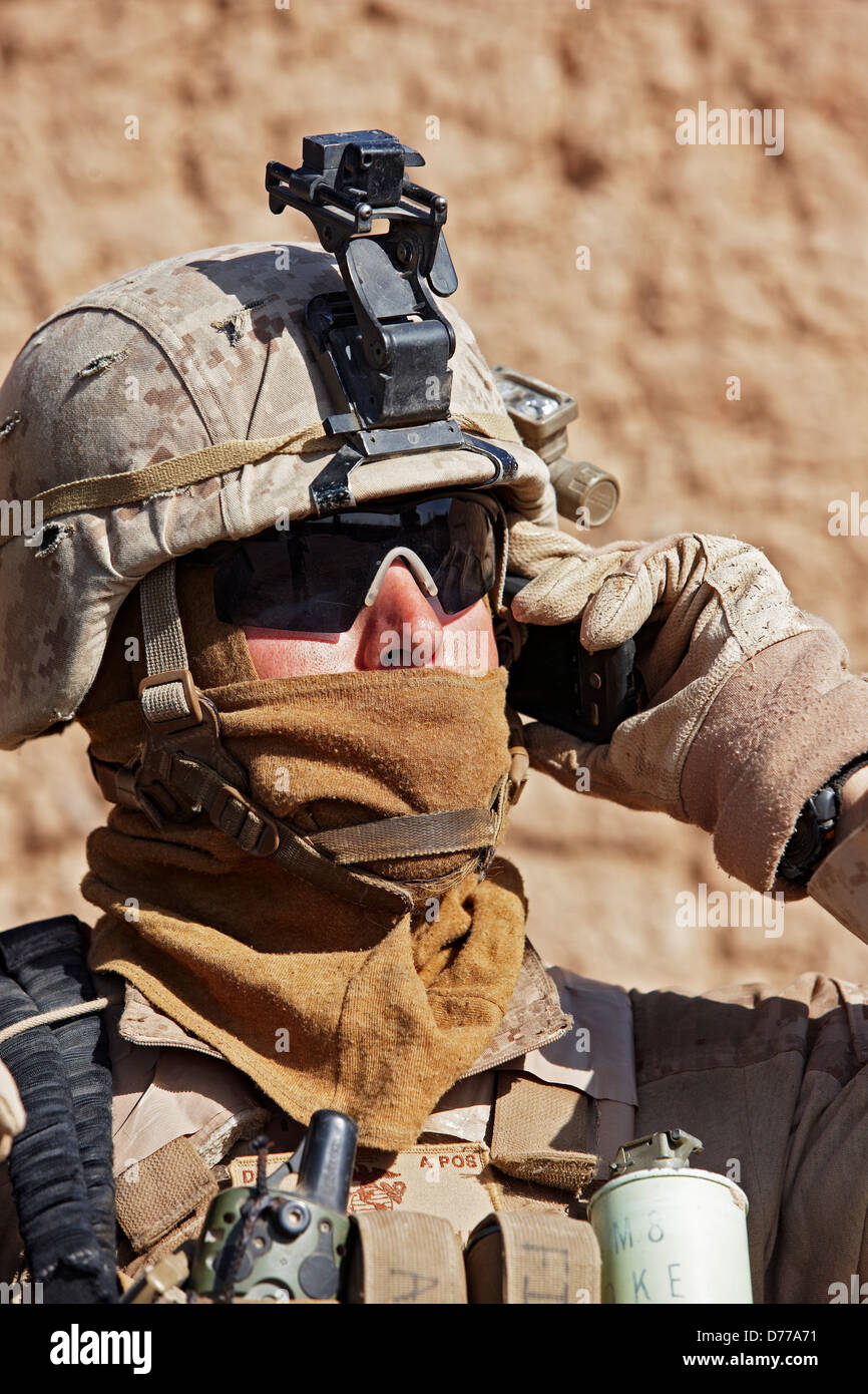 U.S. Marine Speaks on Cellular Smartphone Before Combat Operation in ...