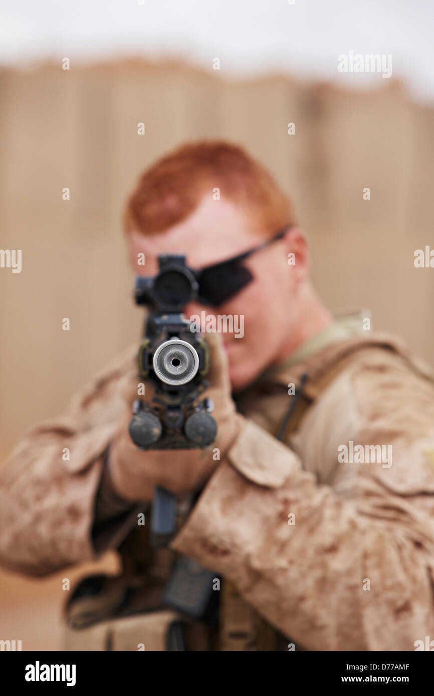 A U.S. Marine Aims High Power Rifle Fitted Suppressor Stock Photo - Alamy