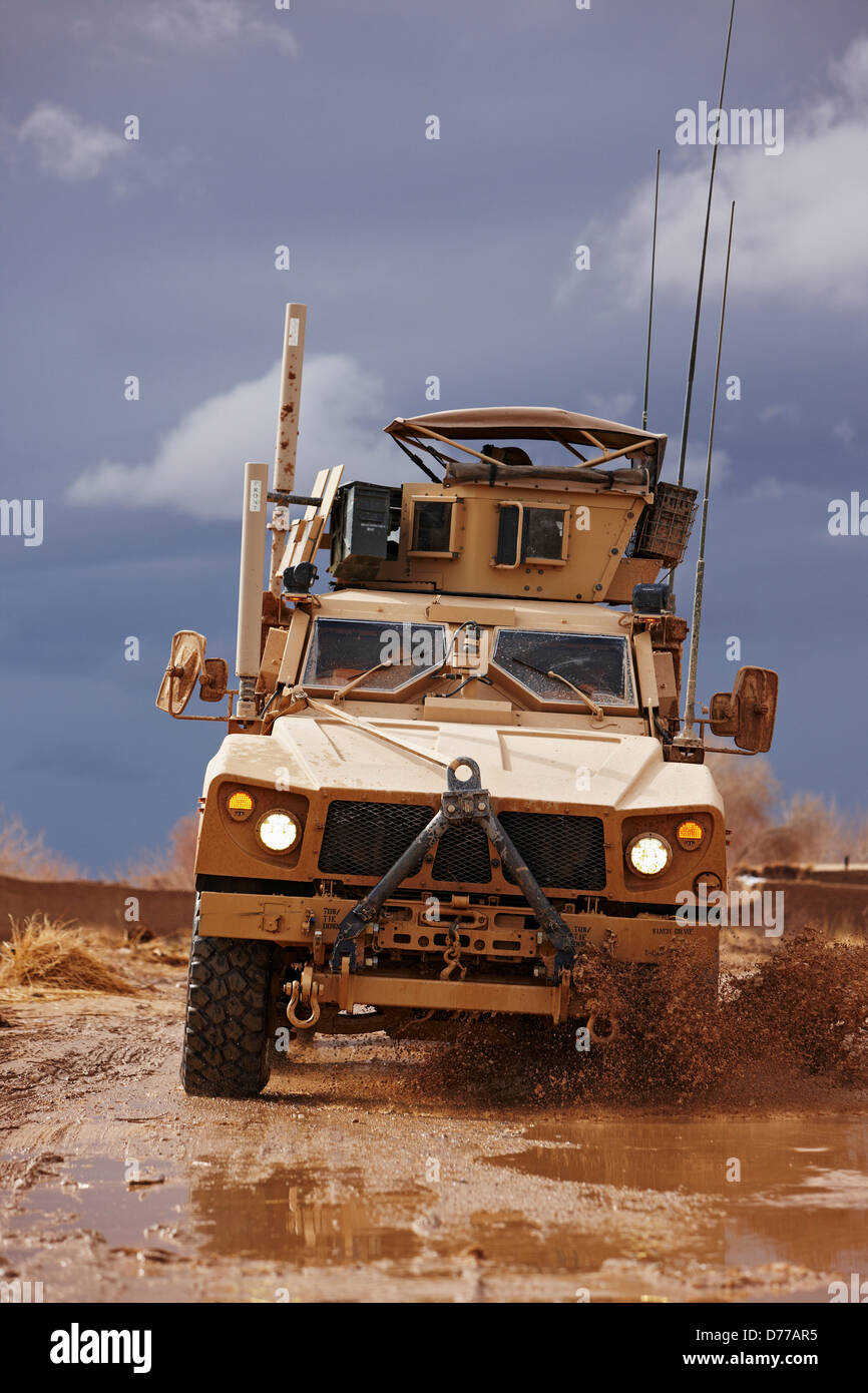 A U.S Marine Corps M-ATV or Mine Resistant Ambush Protected All Terrain Vehicle Crashes Through ...