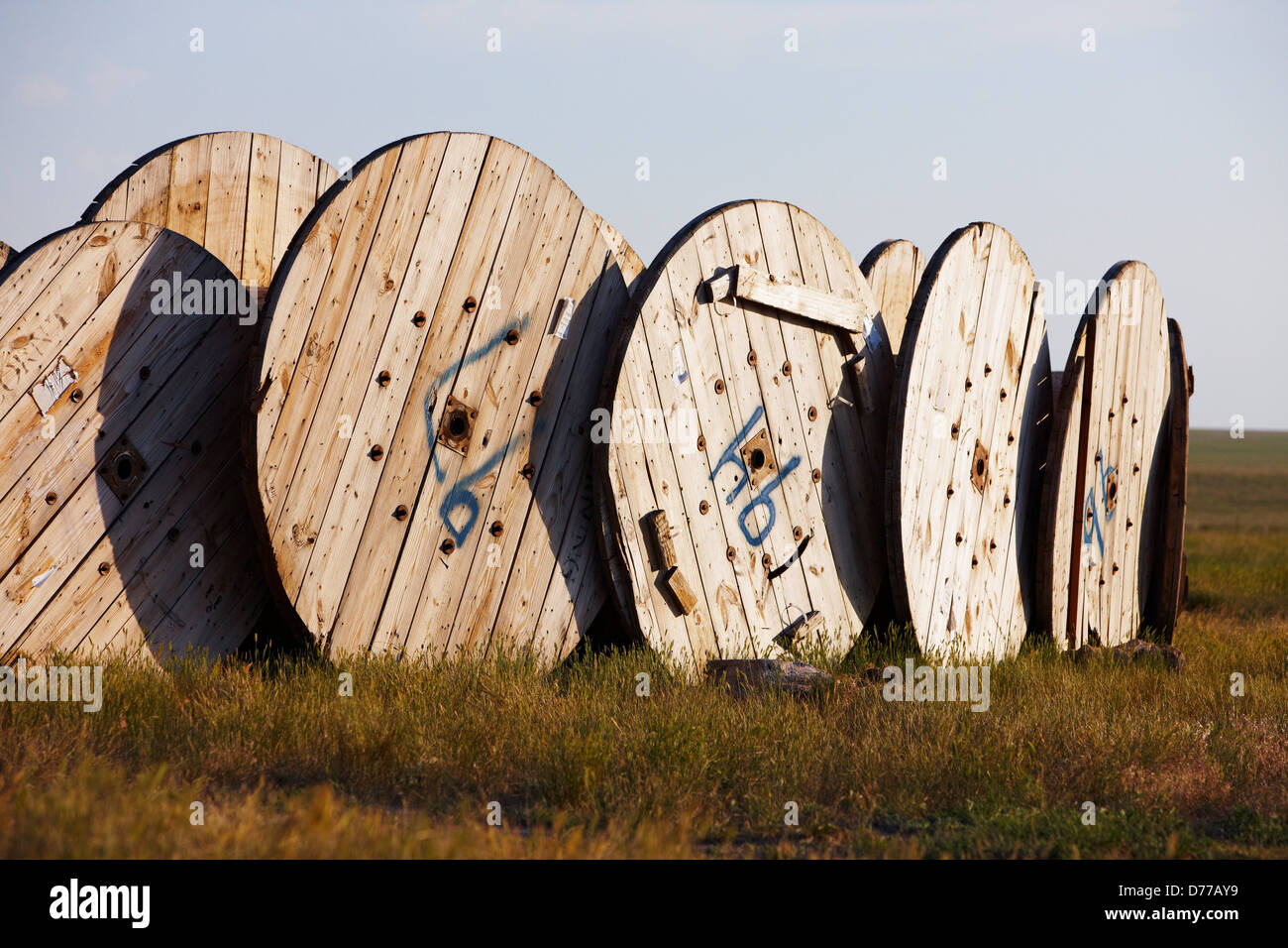 Large Cable Spools Arranged to Make Fenced Enclosure Stock Photo - Alamy