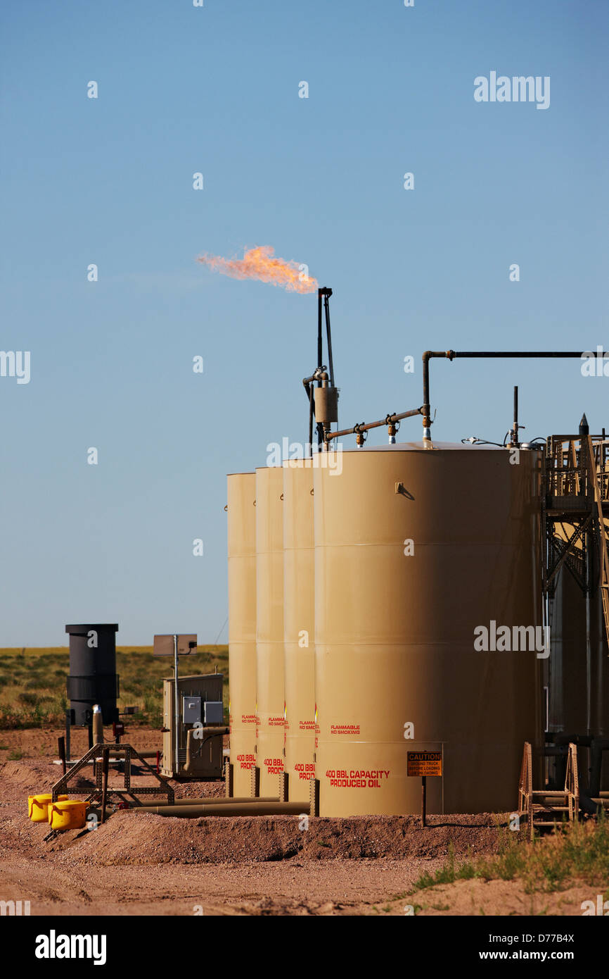 A Gas Flare Crude Oil Storage Tanks Stock Photo - Alamy