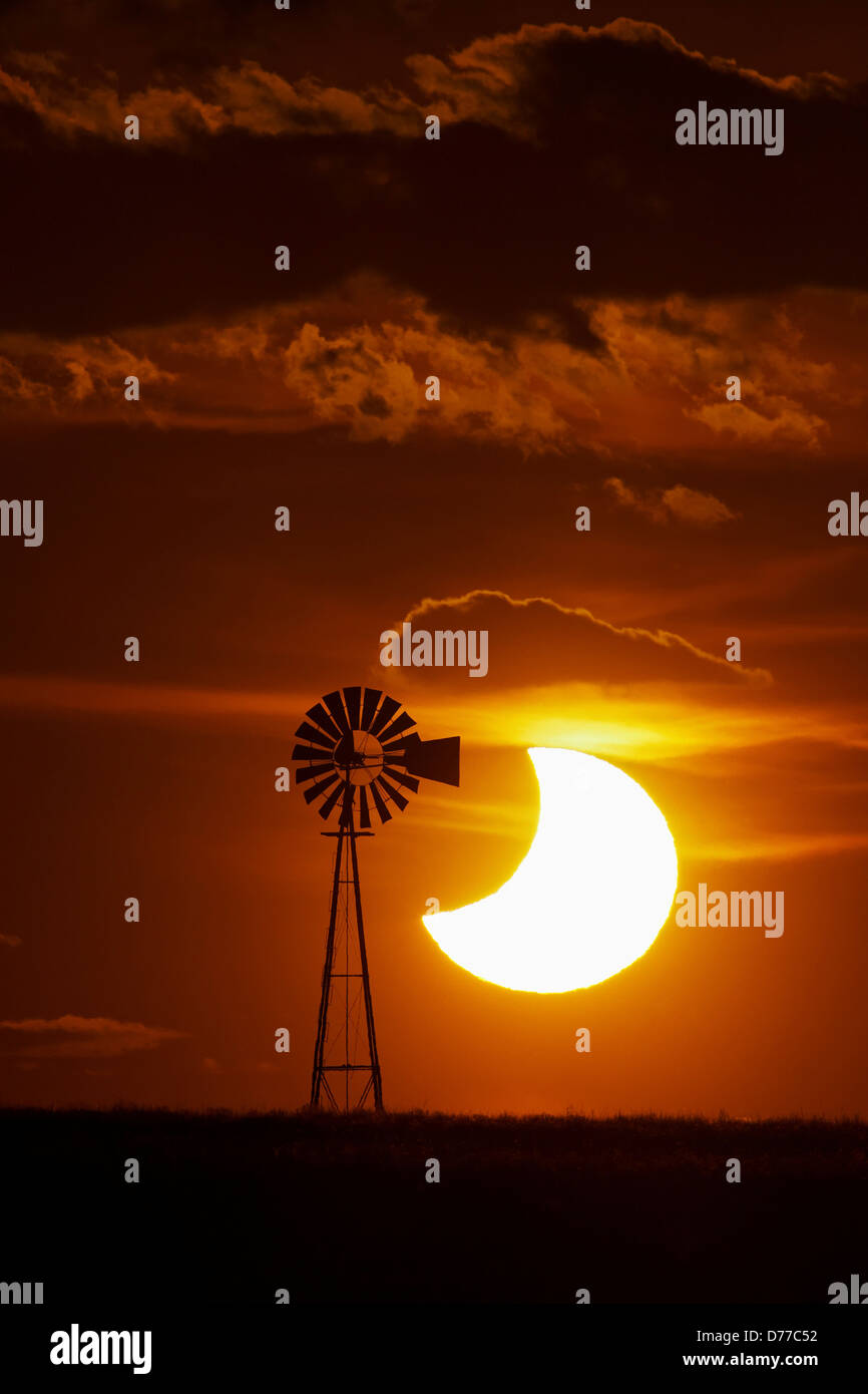 Windmill Silhouetted by Solar Eclipse Stock Photo - Alamy
