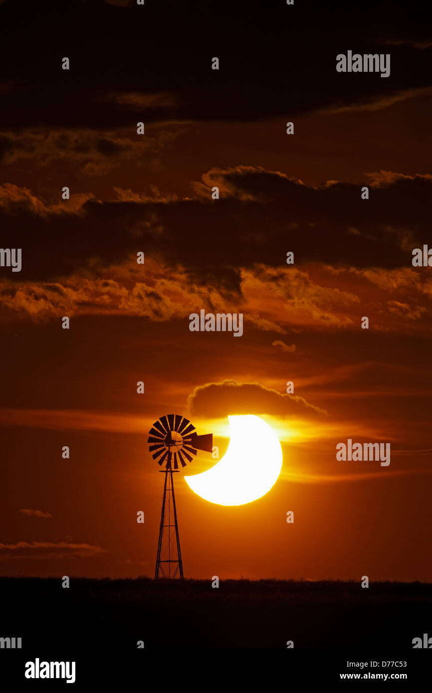 Windmill Silhouetted by Solar Eclipse Stock Photo - Alamy