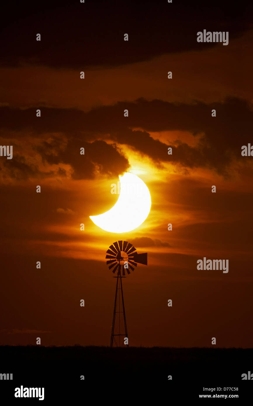 Windmill Silhouetted by Solar Eclipse Stock Photo - Alamy