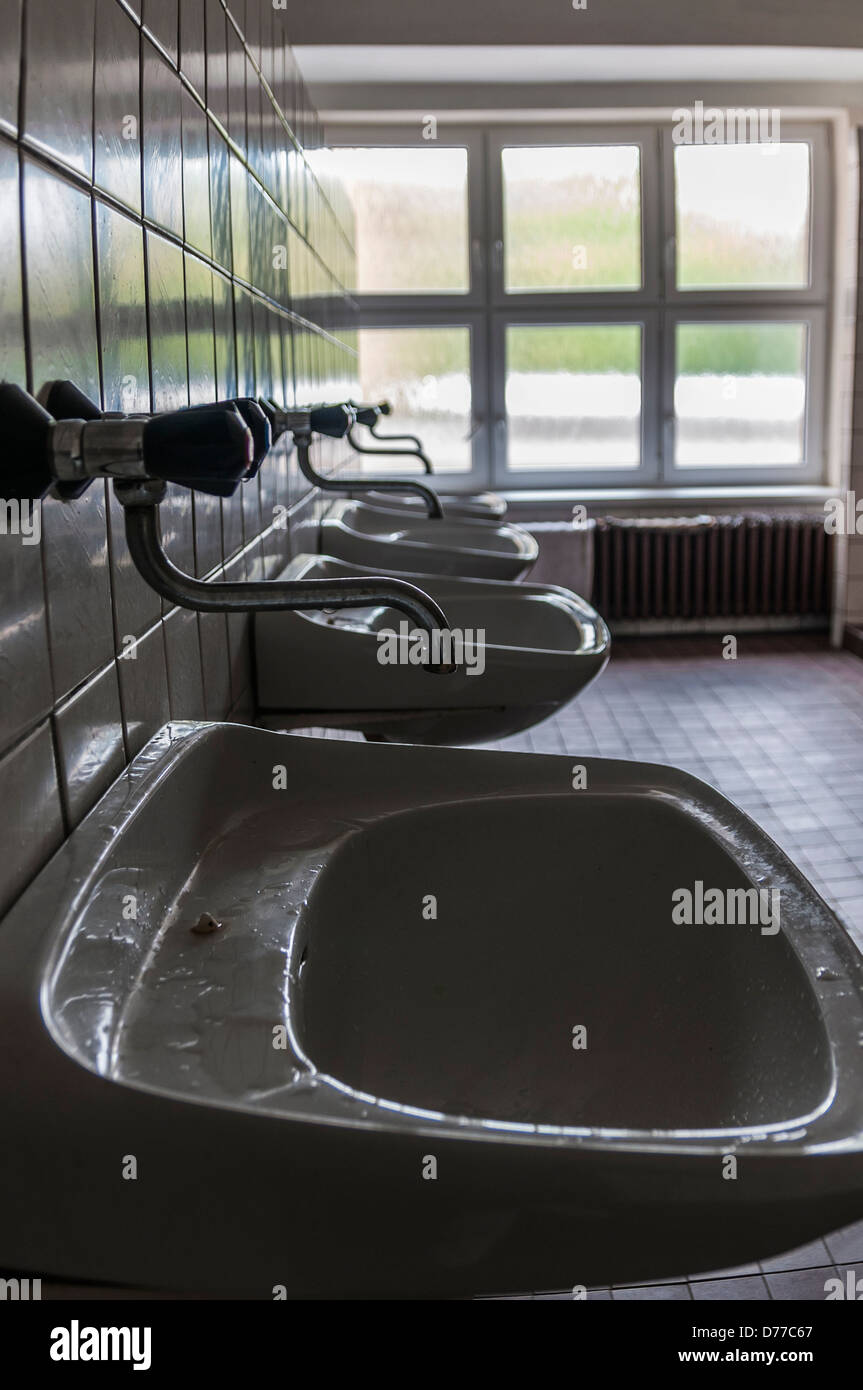 sinks in school locker room Stock Photo - Alamy
