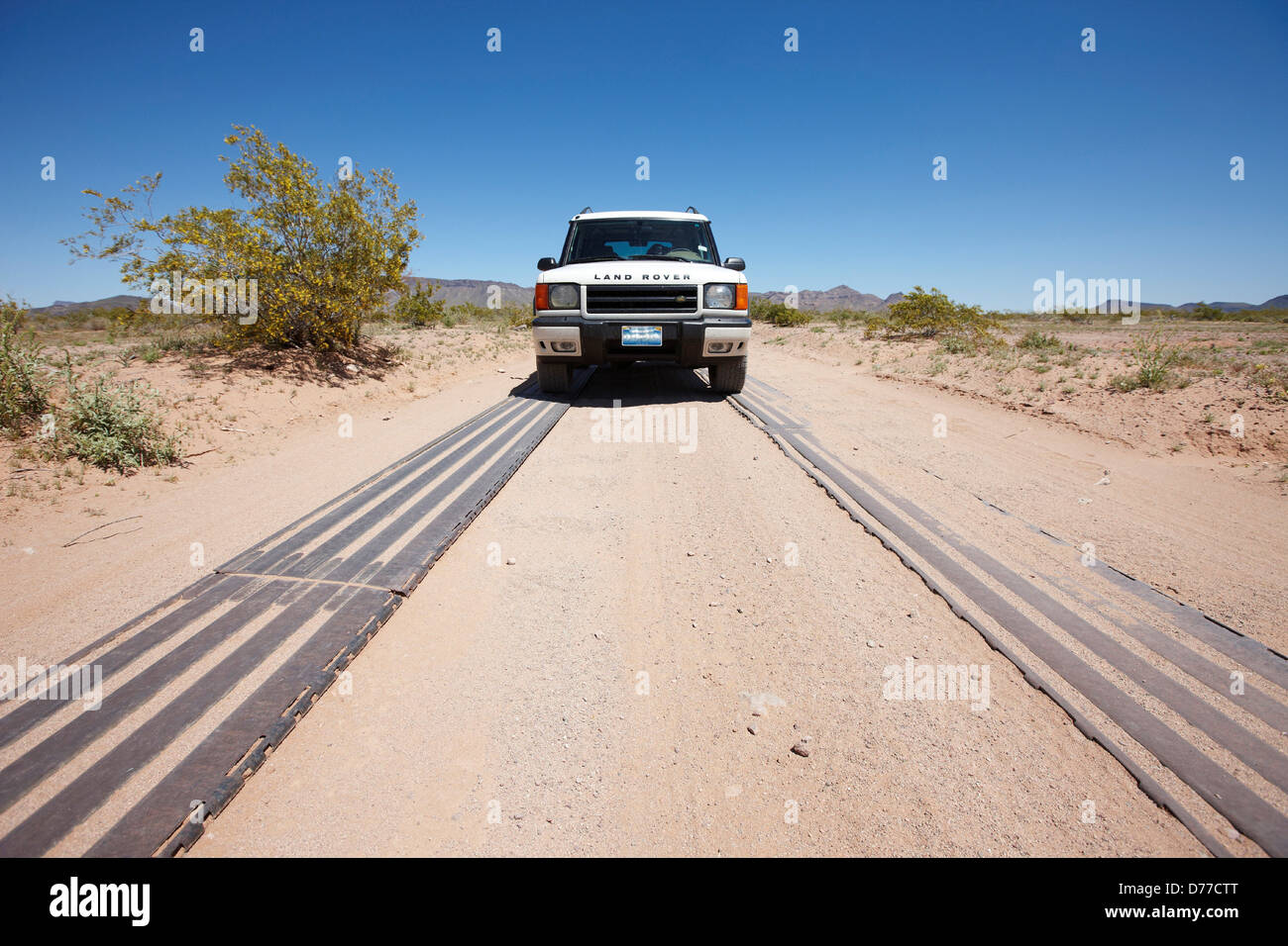Metal tracks used to reinforce eroding dirt road heavily used by U.S ...