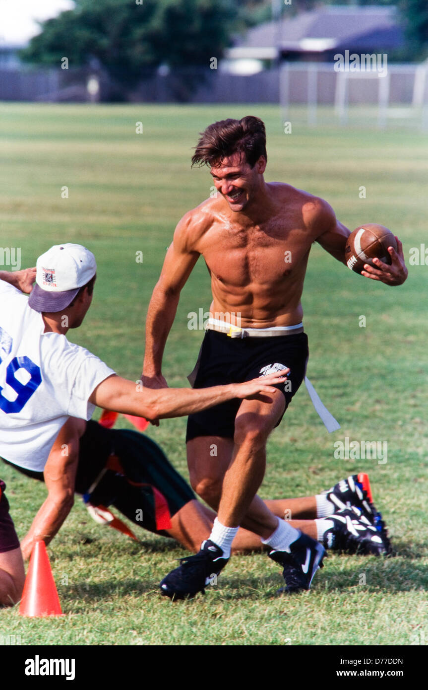 Men playing football, running and motion effects, team competition ...