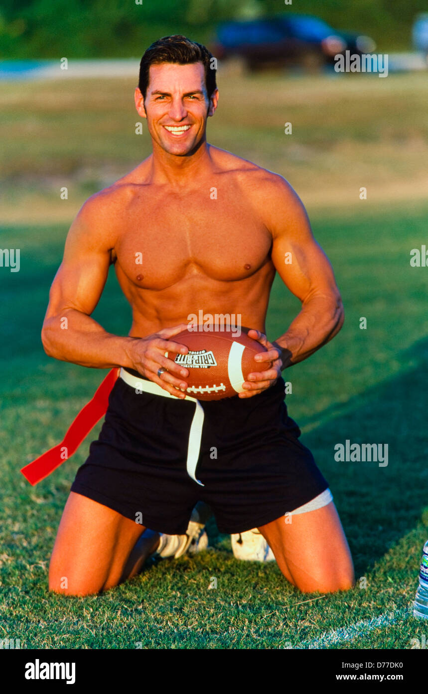 Men playing football, portrait of competitor, team competition, sunny ...