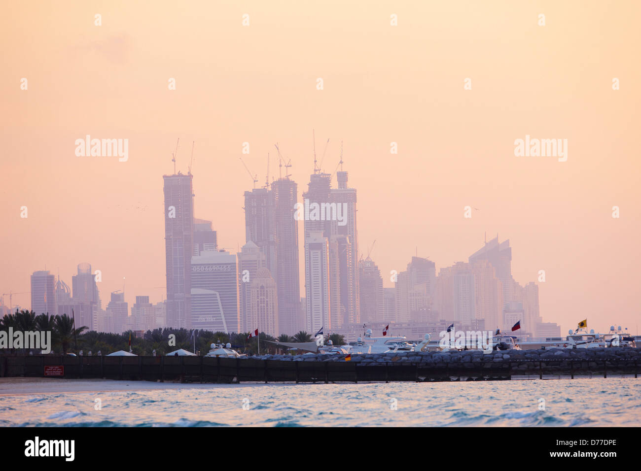 Cluster high rise buildings at dusk Dubai United Arab Emirates Stock ...